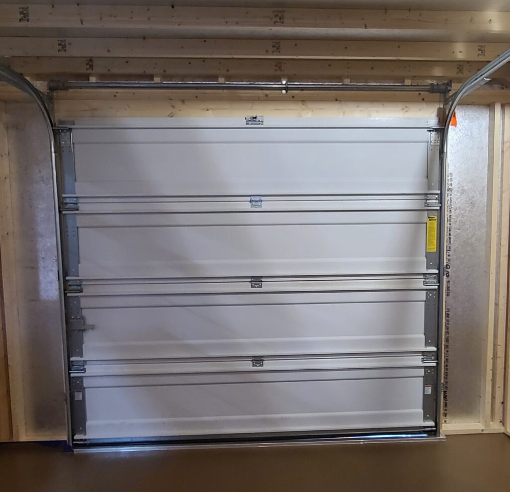 9X7 Wayne Dalton Garage Door (PICK UP ONLY) - Pro-Shed Buildings